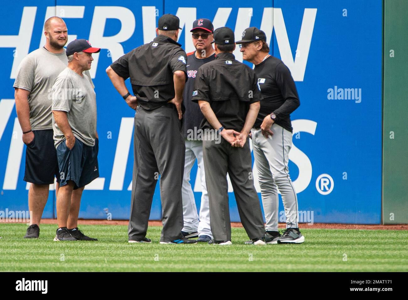 Unidentified members of the Cleveland Guardians grounds crew, left ...
