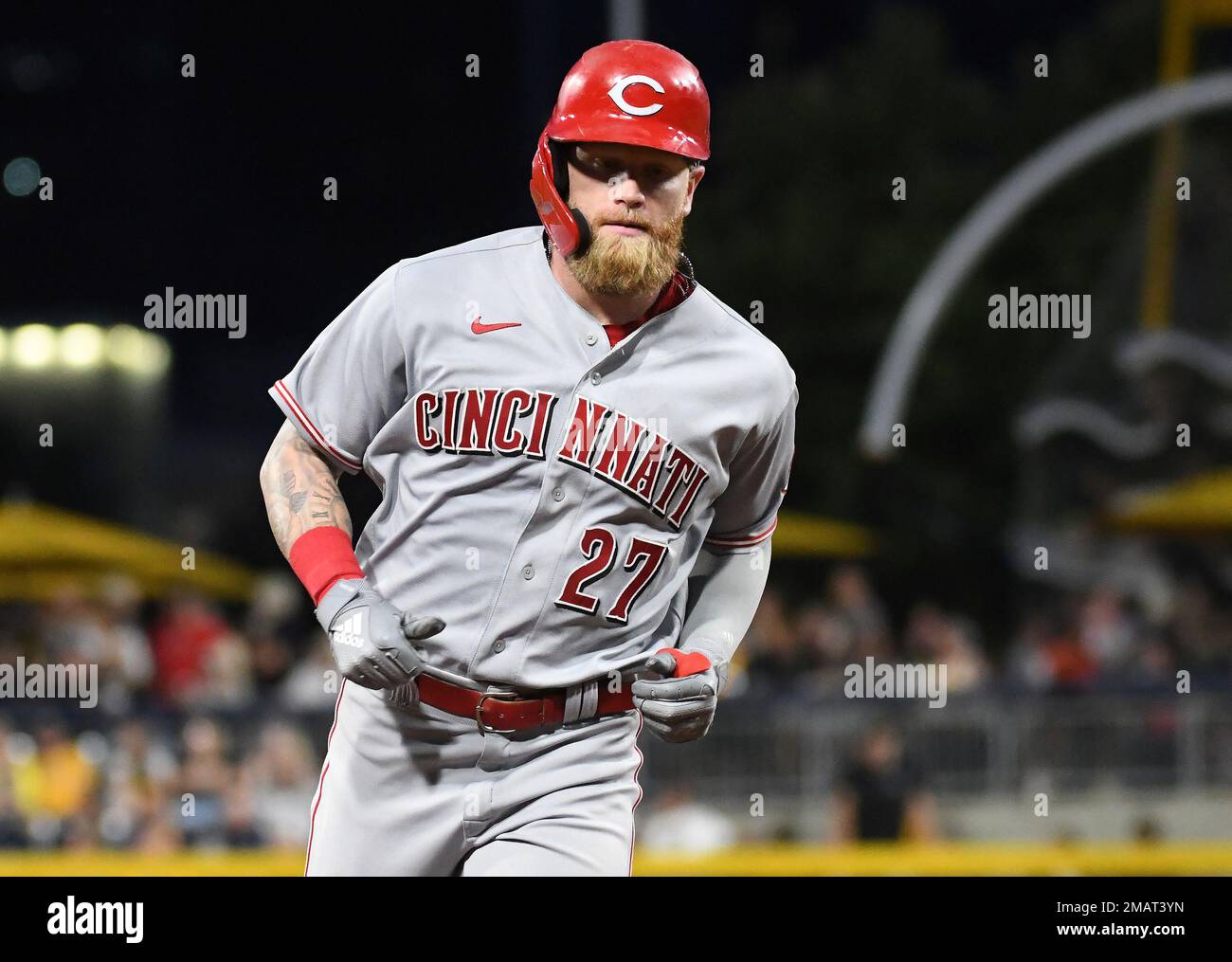 Cincinnati Reds' Jake Fraley rounds second base after hitting a two-run ...