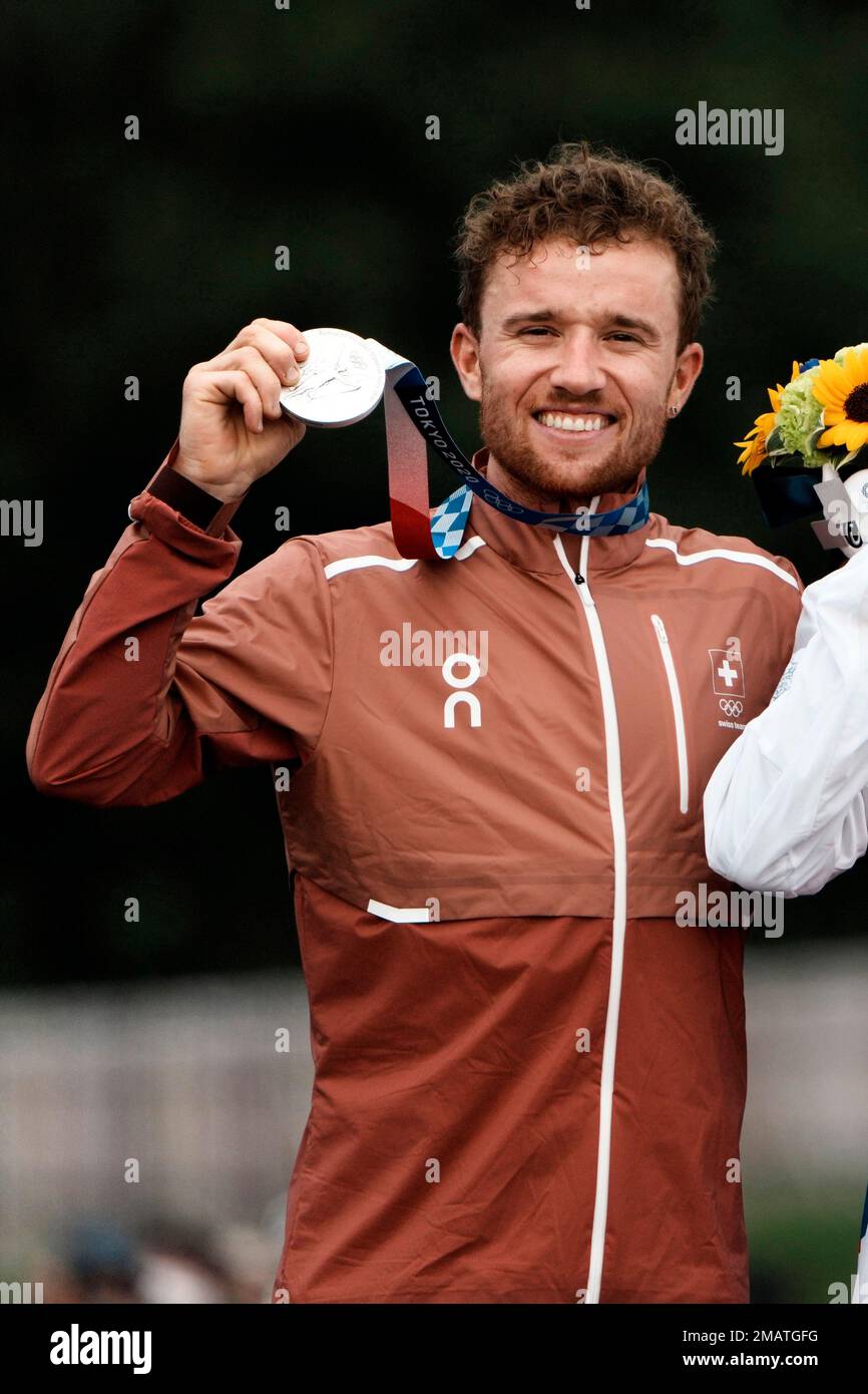FILE - Silver medalist Mathias Flueckiger of Switzerland poses during a ...