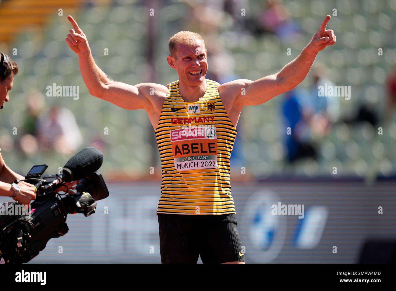 Arthur Abele, of Germany, reacts after running alone in a Men's ...