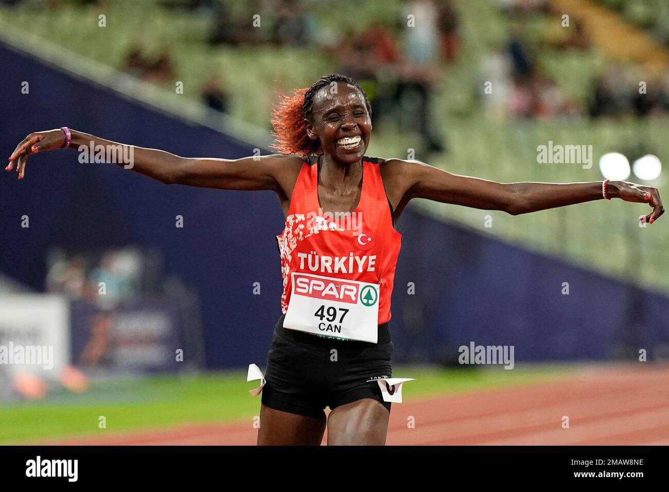Yasemin Can, of Turkey, reacts after winning the gold medal in the ...