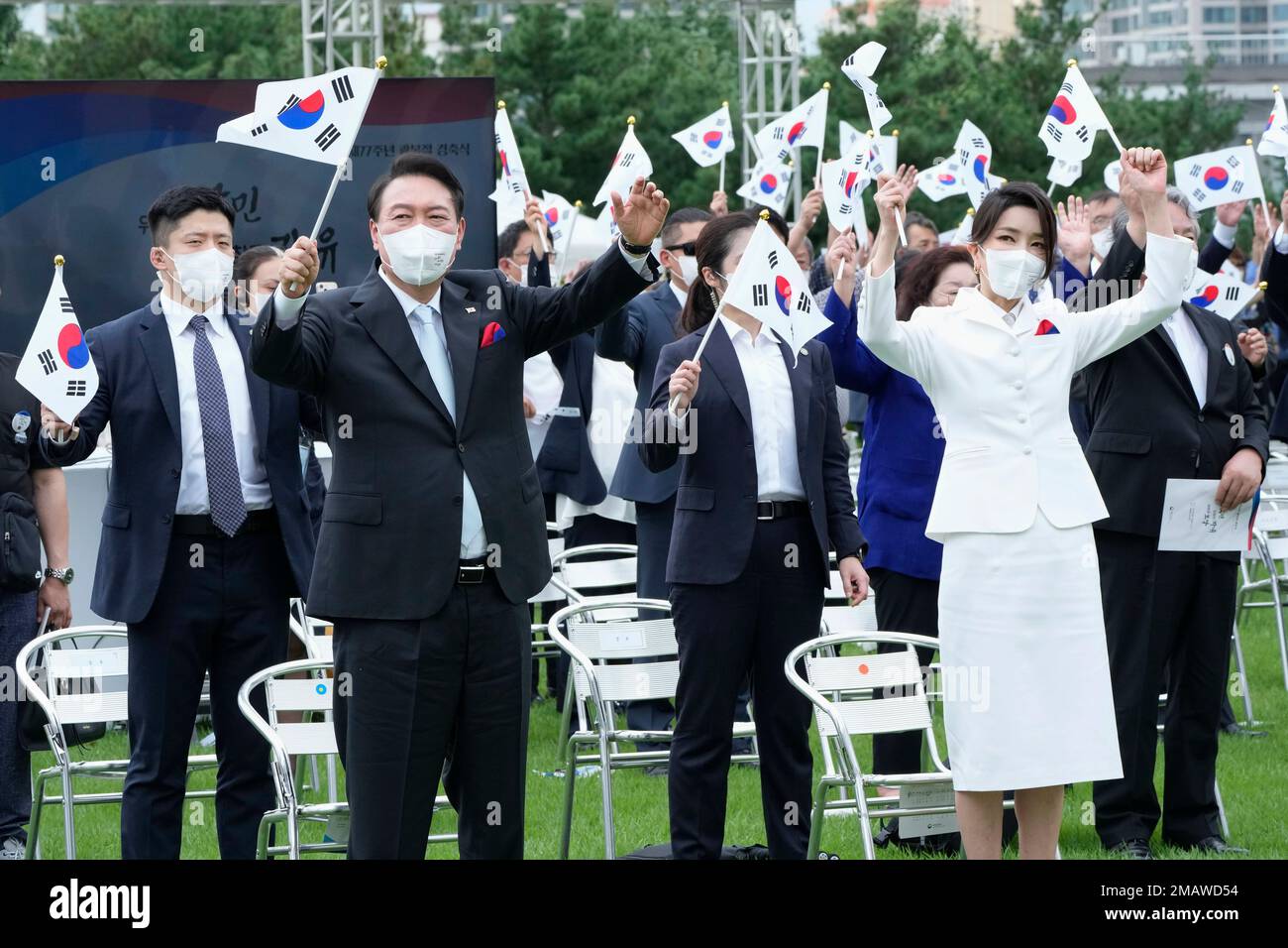 South Korean President Yoon Suk Yeol, second from left, and his wife ...
