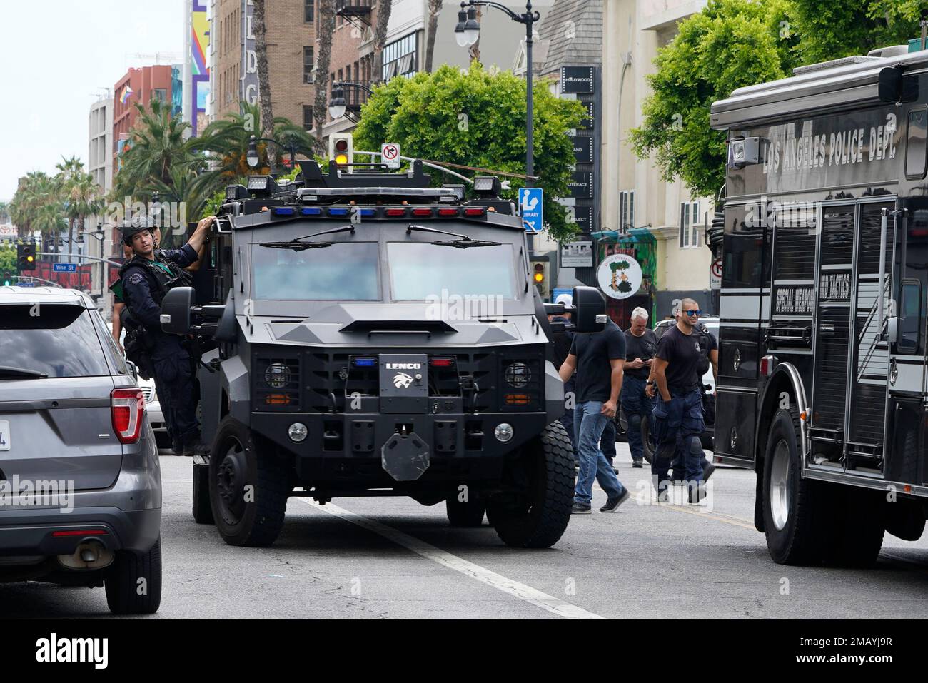 FILE - Los Angeles Police Department Special Weapons and Tactics (SWAT) team members leave ...