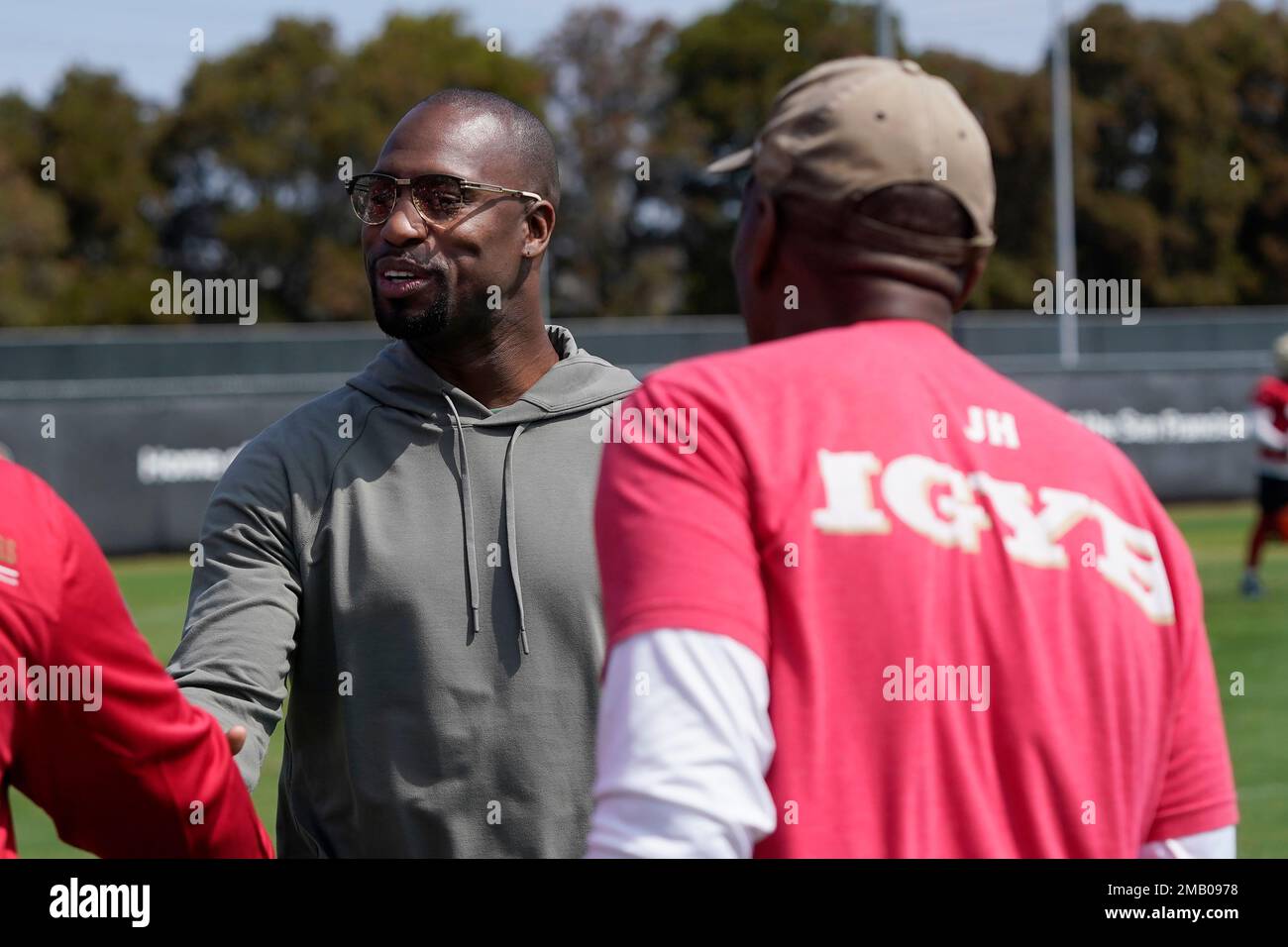 Former San Francisco 49ers players Vernon Davis, left, and Keena Turner ...