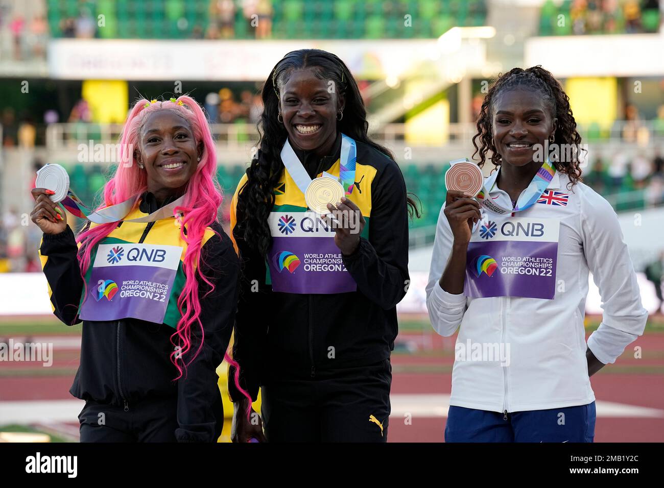 Gold medalist Shericka Jackson, of Jamaica, center, silver medalist ...