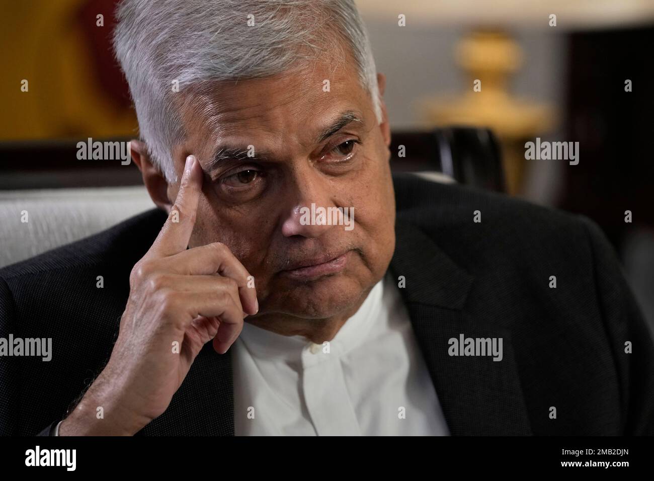 FILE - Sri Lanka's new Prime Minister Ranil Wickremesinghe gestures during an interview with The ...