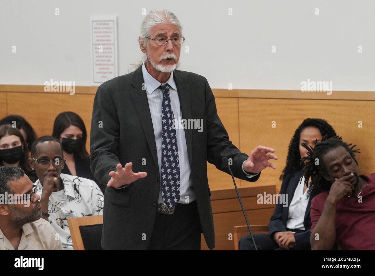 Attorney Ron Kuby, center, speaks during the exoneration hearing for ...