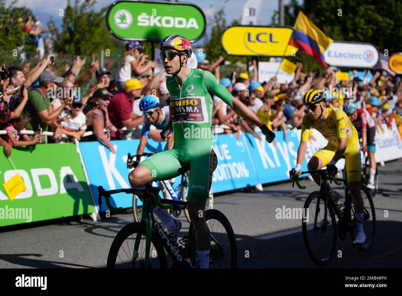 Stage winner Belgium's Wout Van Aert, wearing the best sprinter's green ...