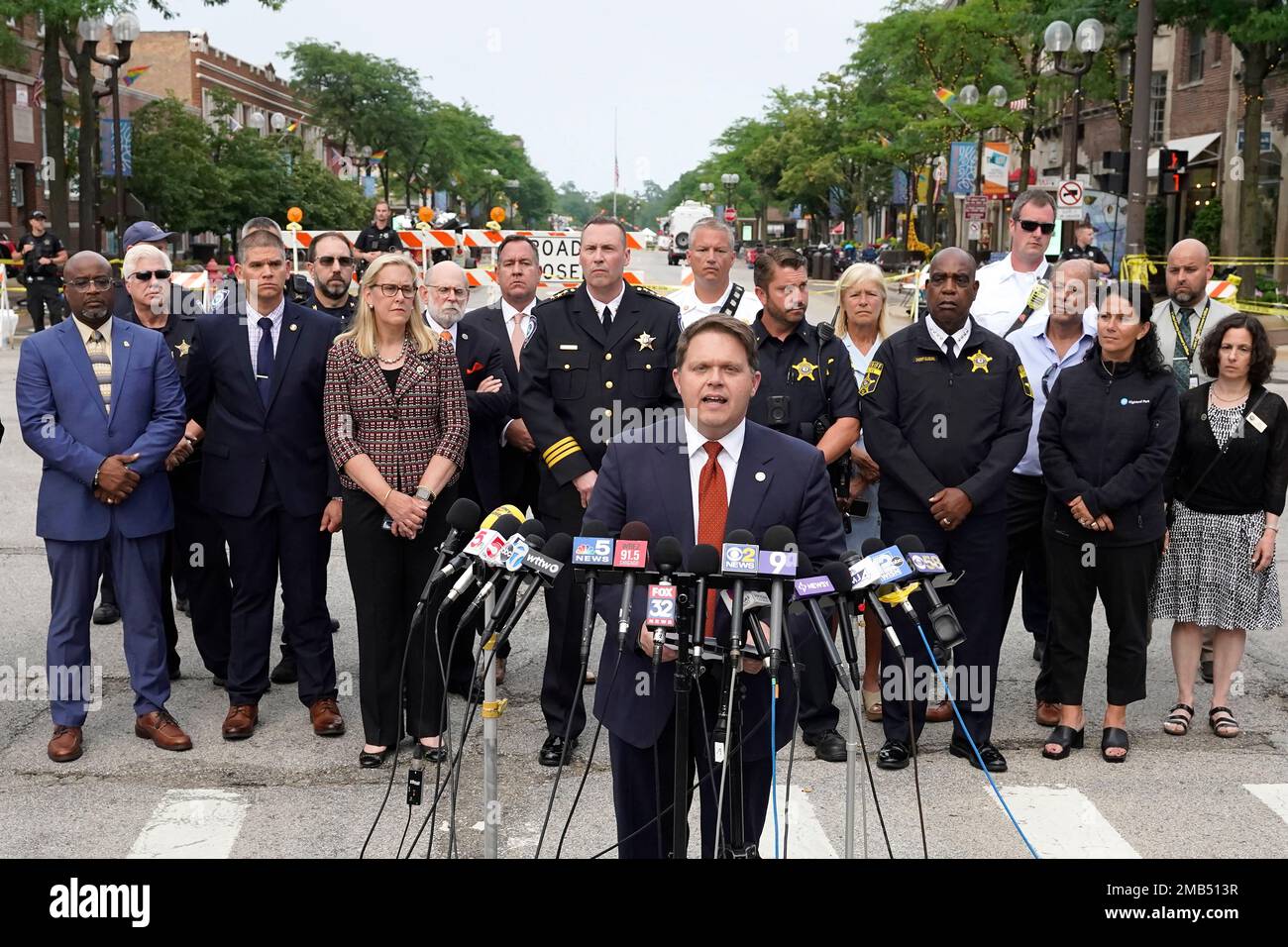Surrounded by state, local and federal law enforcement officials, Lake ...