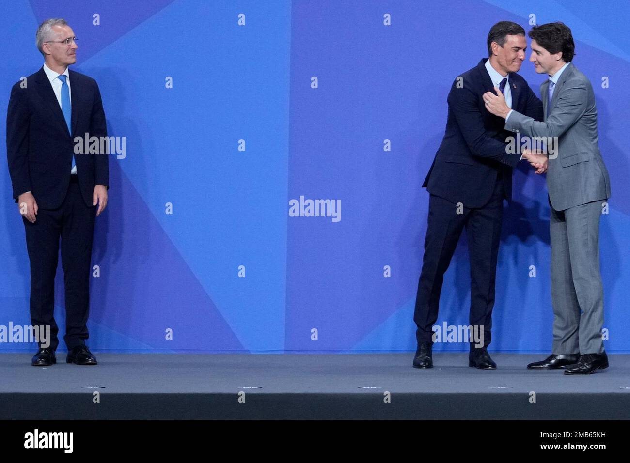 Canadian Prime Minister Justin Trudeau, right, is welcomed by Spanish ...