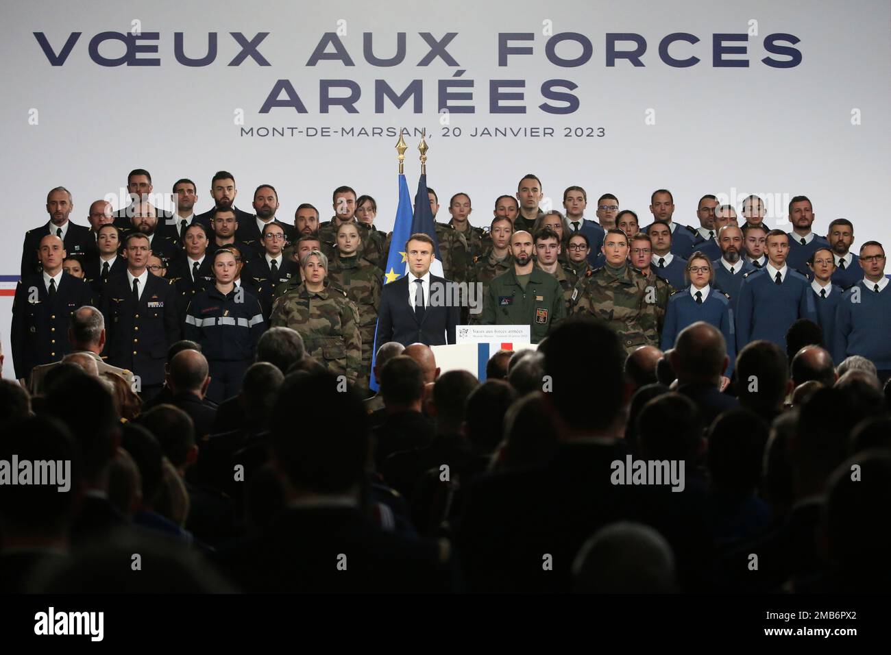 French President Emmanuel Macron sings the national anthem after ...