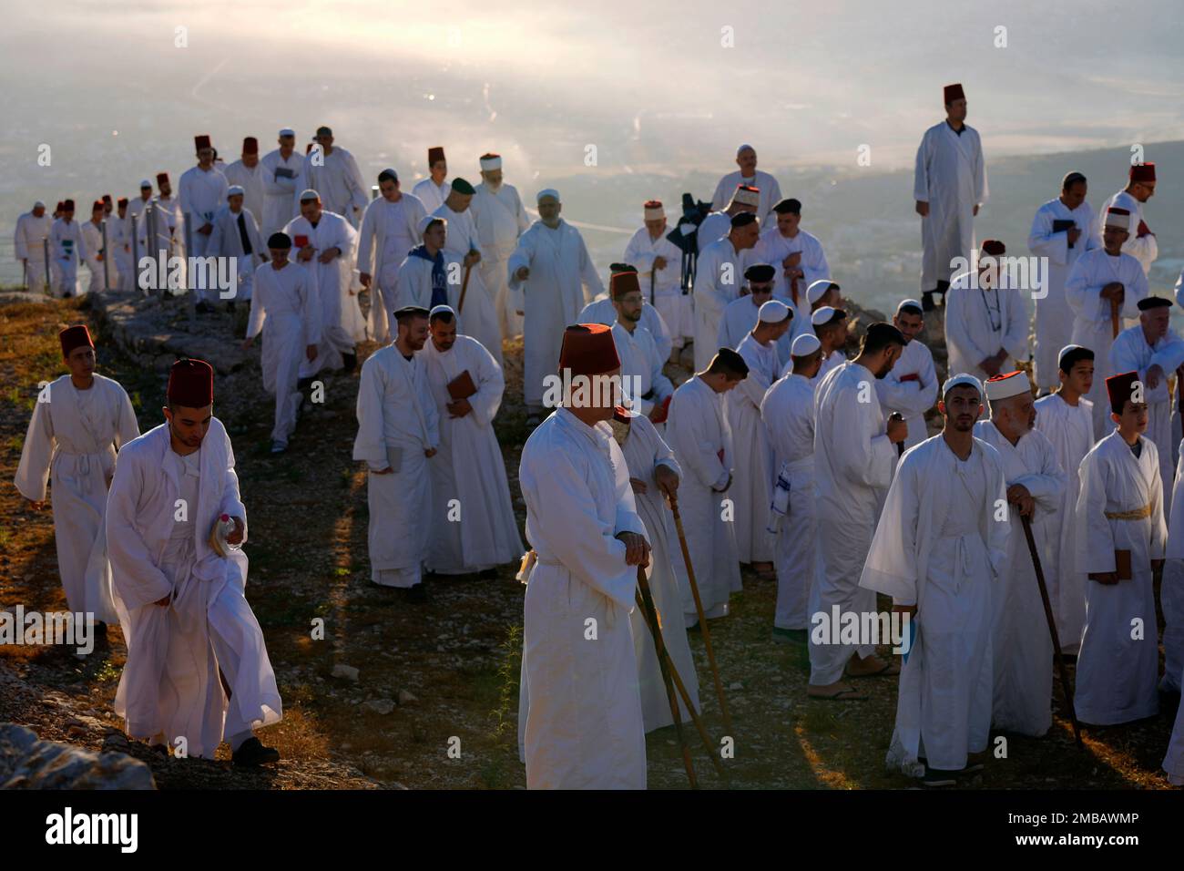 Members of the ancient Samaritan community pray during the holiday of ...
