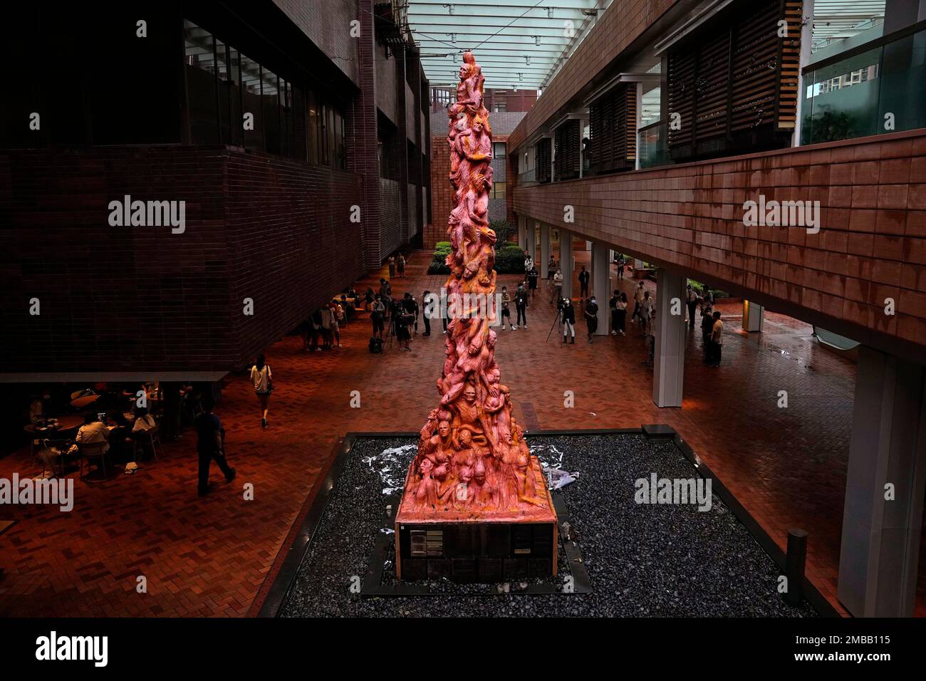 FILE - The "Pillar of Shame" statue, a memorial for those who were ...