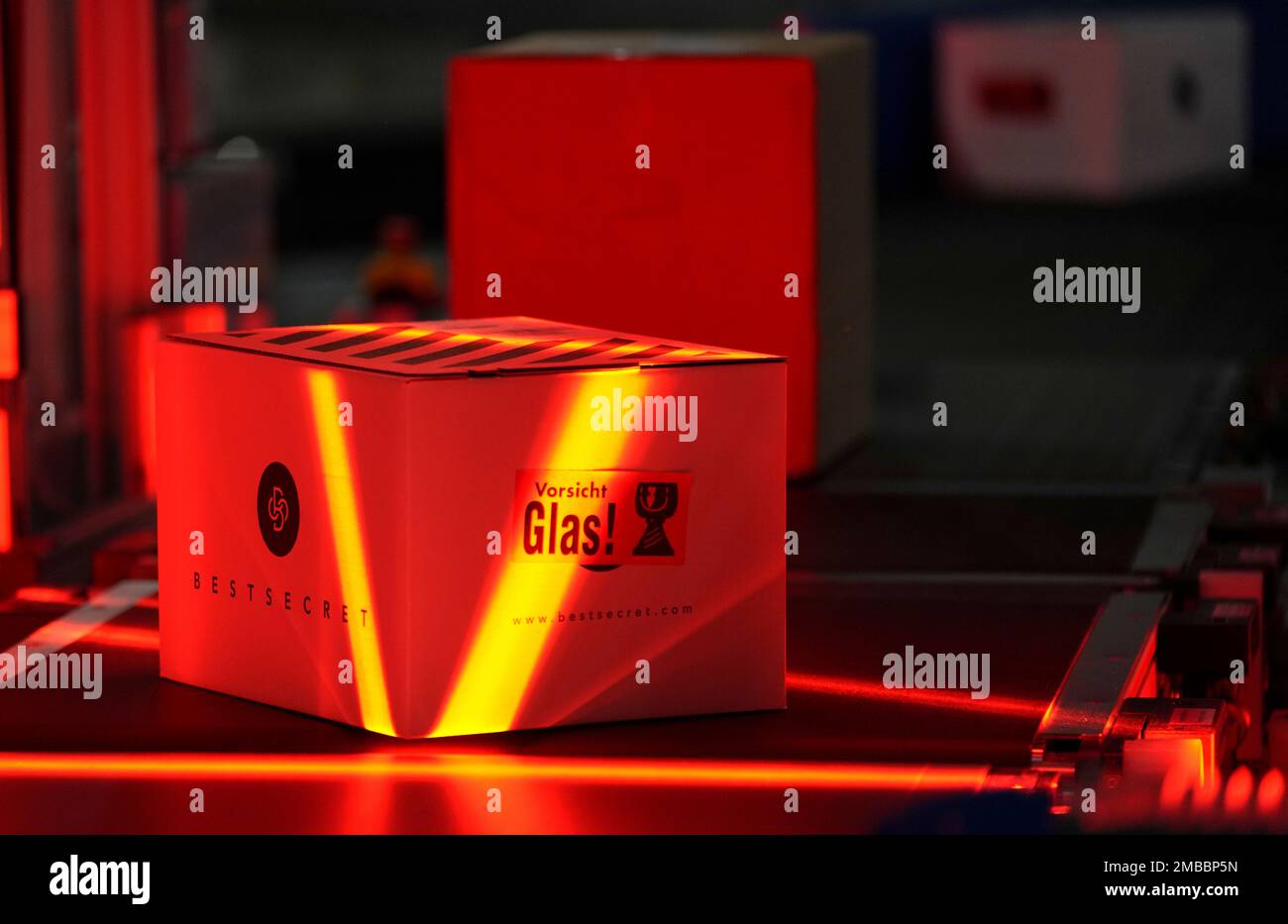 The address label of a parcel is scanned as the parcel is transported ...
