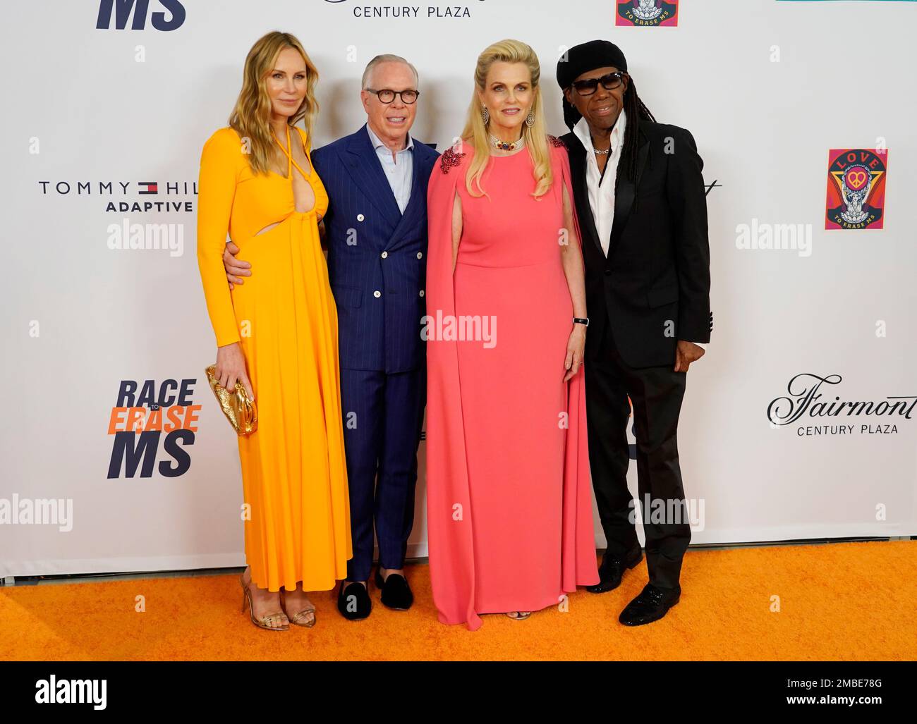 Tommy Hilfiger, second from left, and his wife Dee Ocleppo, far left ...