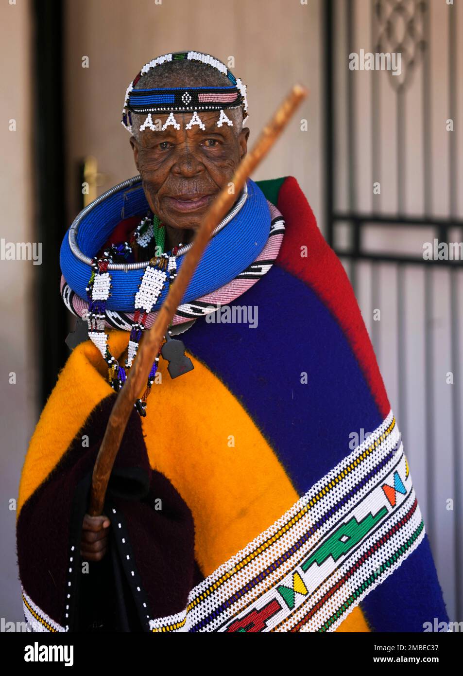 South African artist Esther Mahlangu walks at her home, in Siyabuswa ...