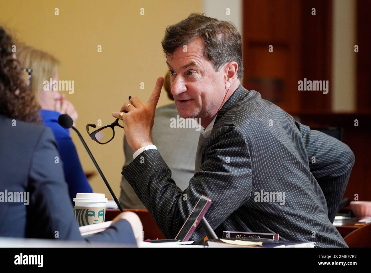 Actor Johnny Depp's attorney Ben Chew, talks with others in the ...