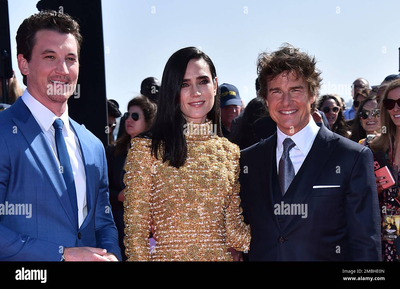 Miles Teller, from left, Jennifer Connelly and Tom Cruise arrive at the ...