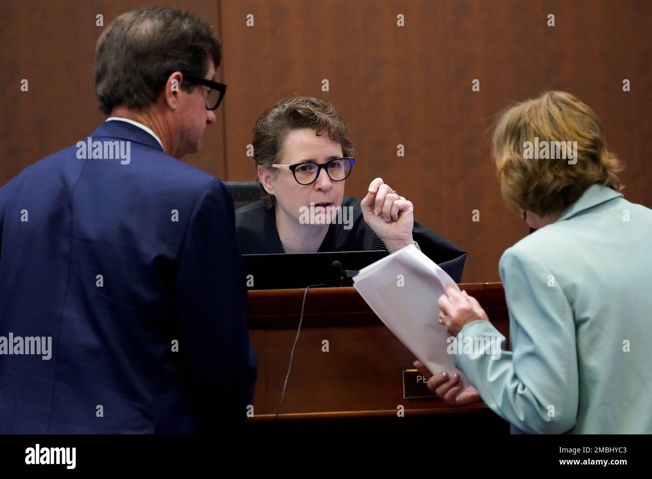 Judge Penney Azcarate speaks to attorneys in the courtroom at the ...