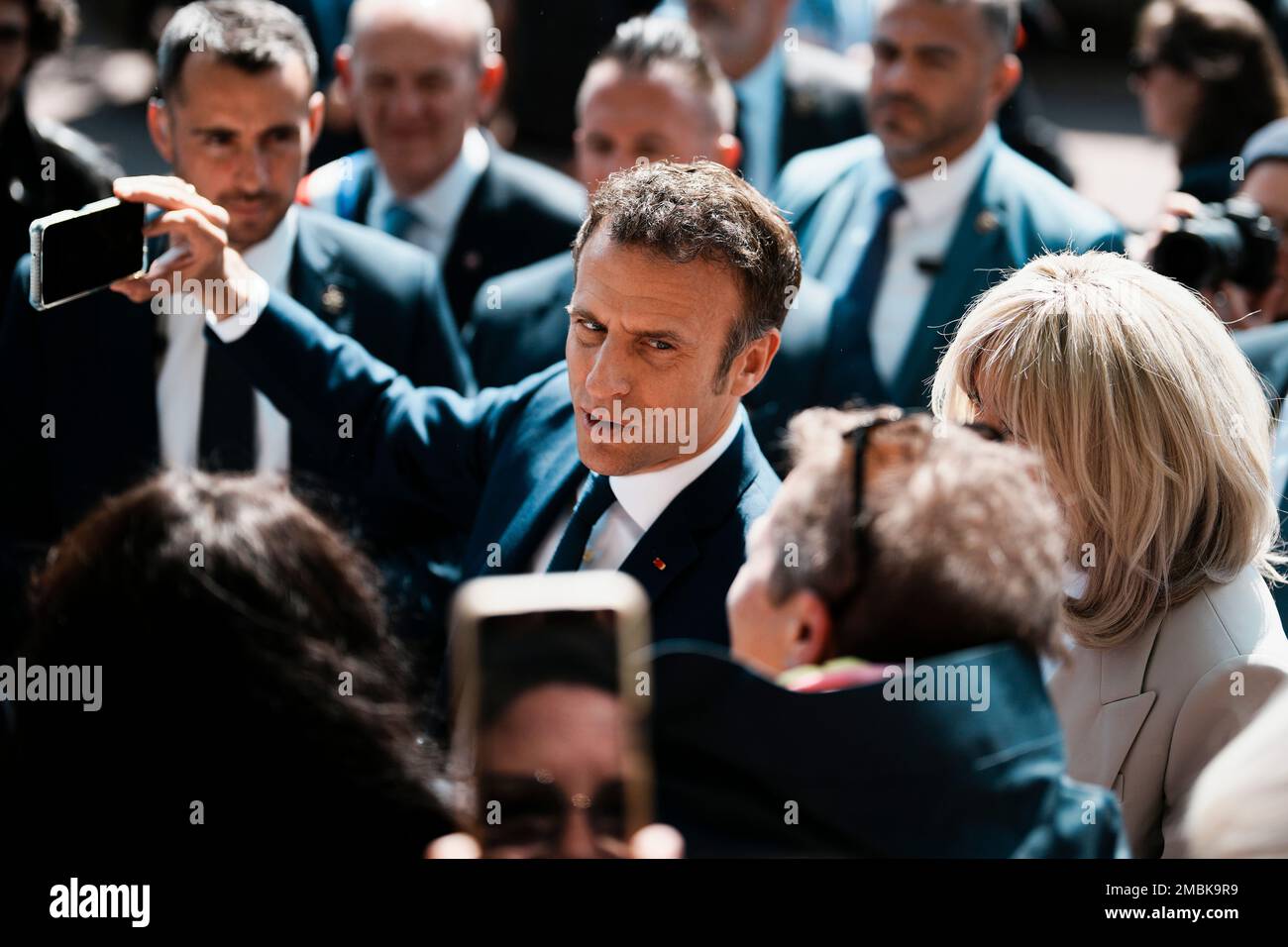 French President and centrist candidate Emmanuel Macron takes an image ...
