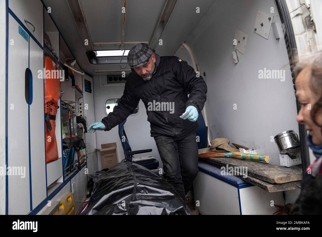 Vlad Minchenko gets out of the vehicle that was carrying the dead body ...