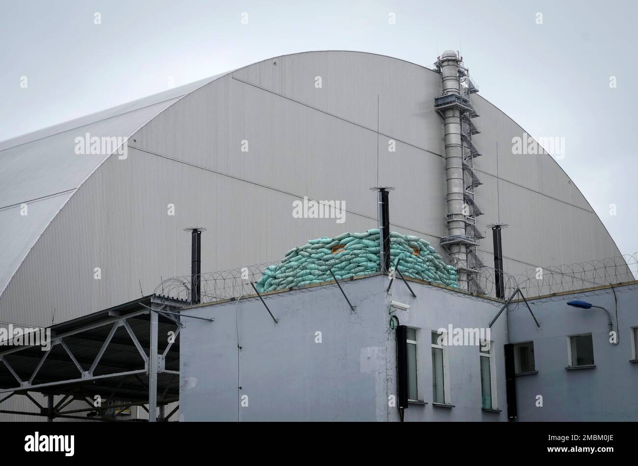 FILE - A Russian firing position sits near a shelter adjacent to the ...