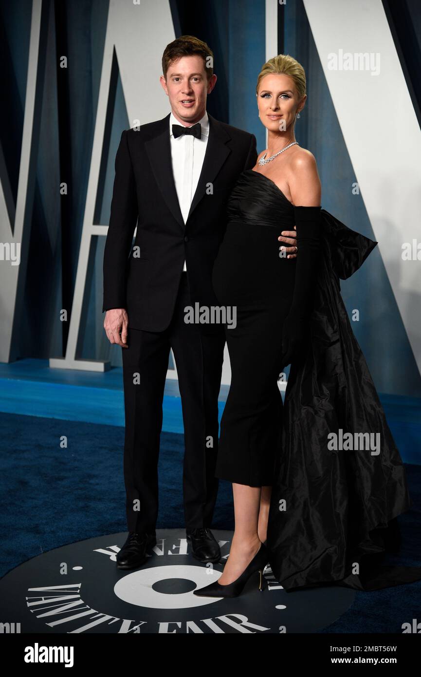 James Rothschild, left, and Nicky Hilton arrive at the Vanity Fair ...