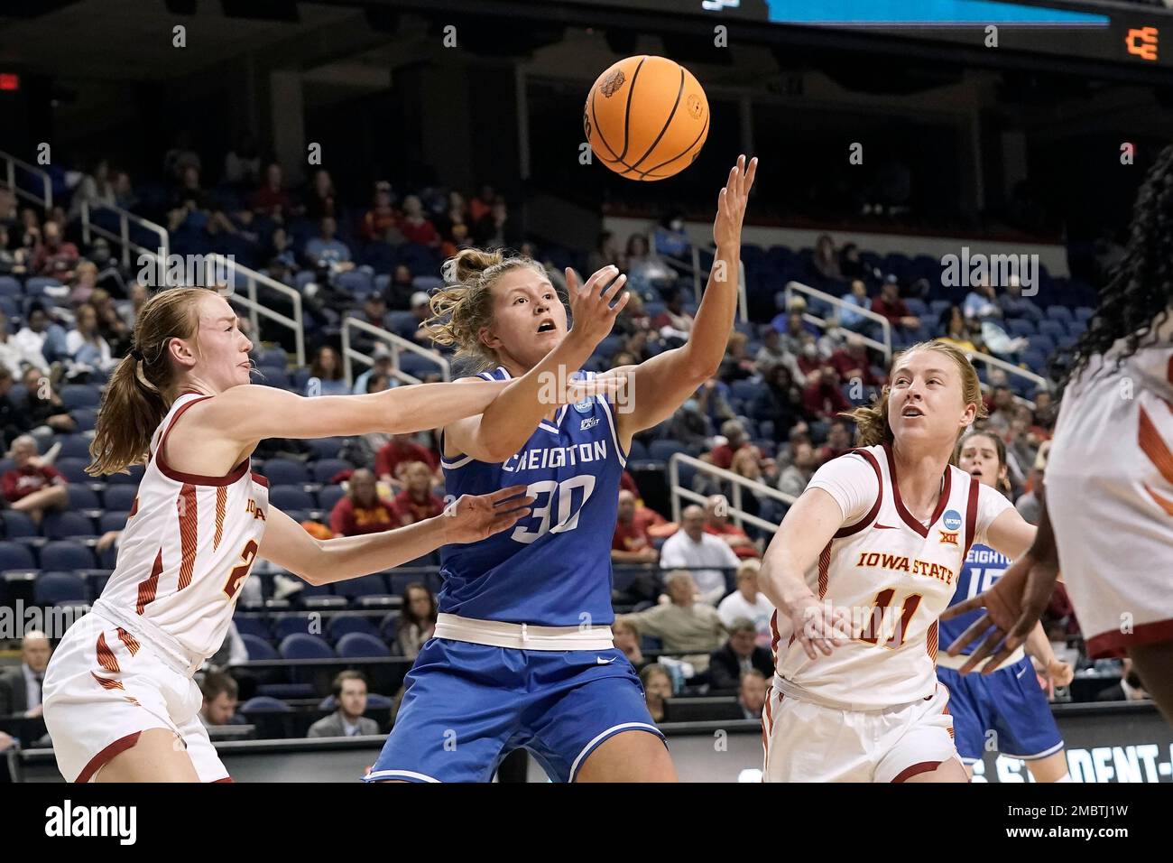 Creighton guard Morgan Maly (30) reaches for the rebound with Iowa ...