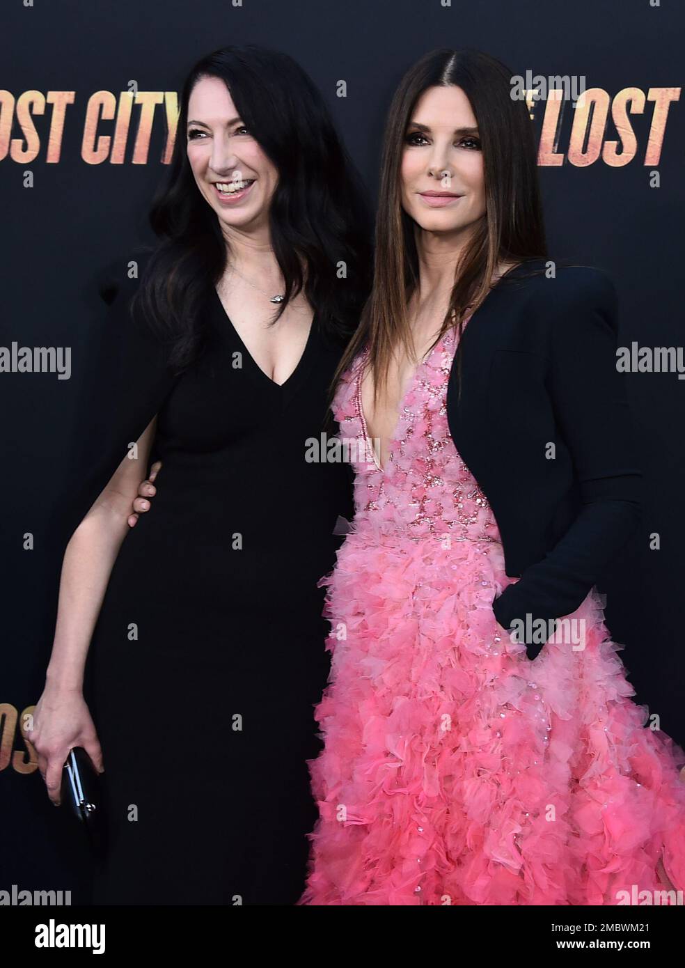 Sandra Bullock, right, and her sister Gesine Bullock Prado arrive at the Los Angeles premiere of ...