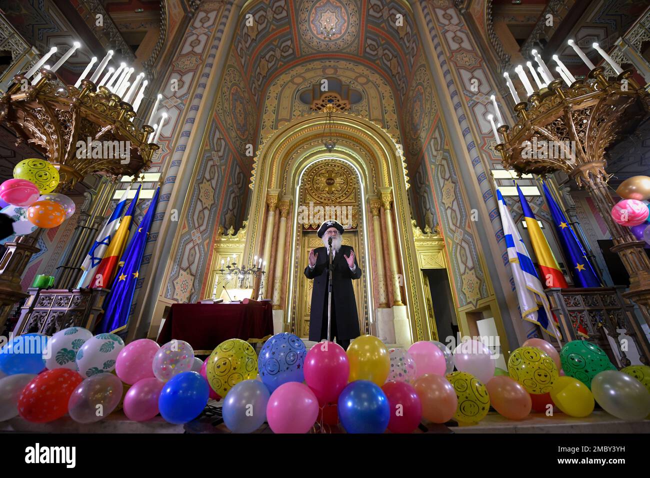 Rabbi Rafael Schaffer delivers a speech as Romania's Jewish community ...