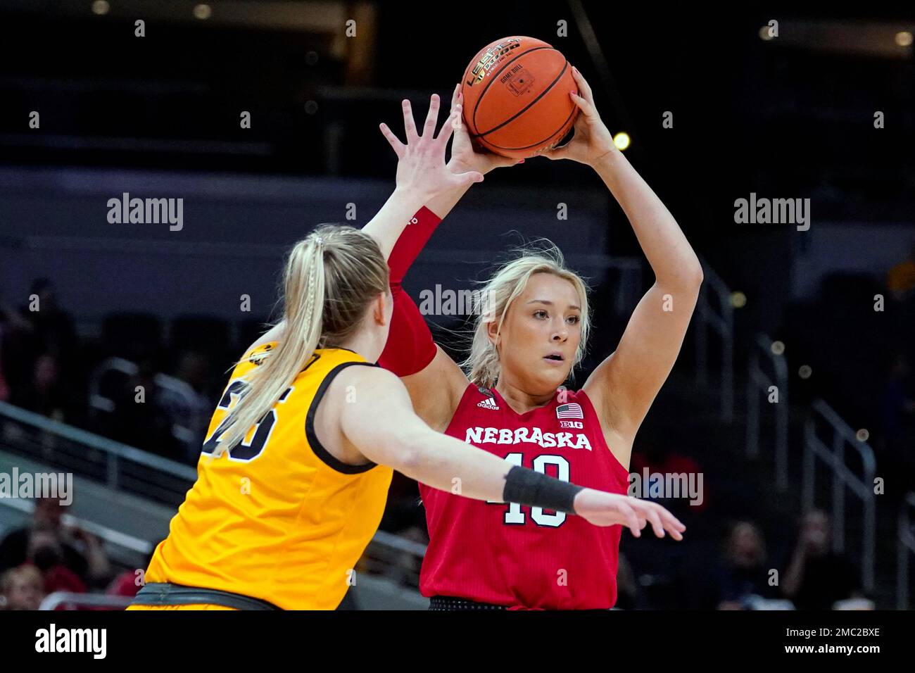 Nebraska center Alexis Markowski (40) makes a pass over Iowa forward ...