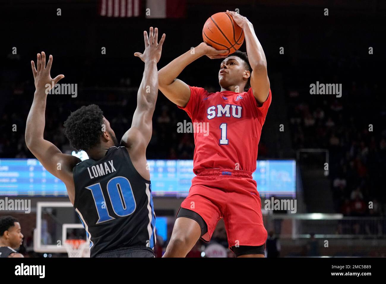 Memphis guard Alex Lomax (10) defends against a shot by SMU guard ...