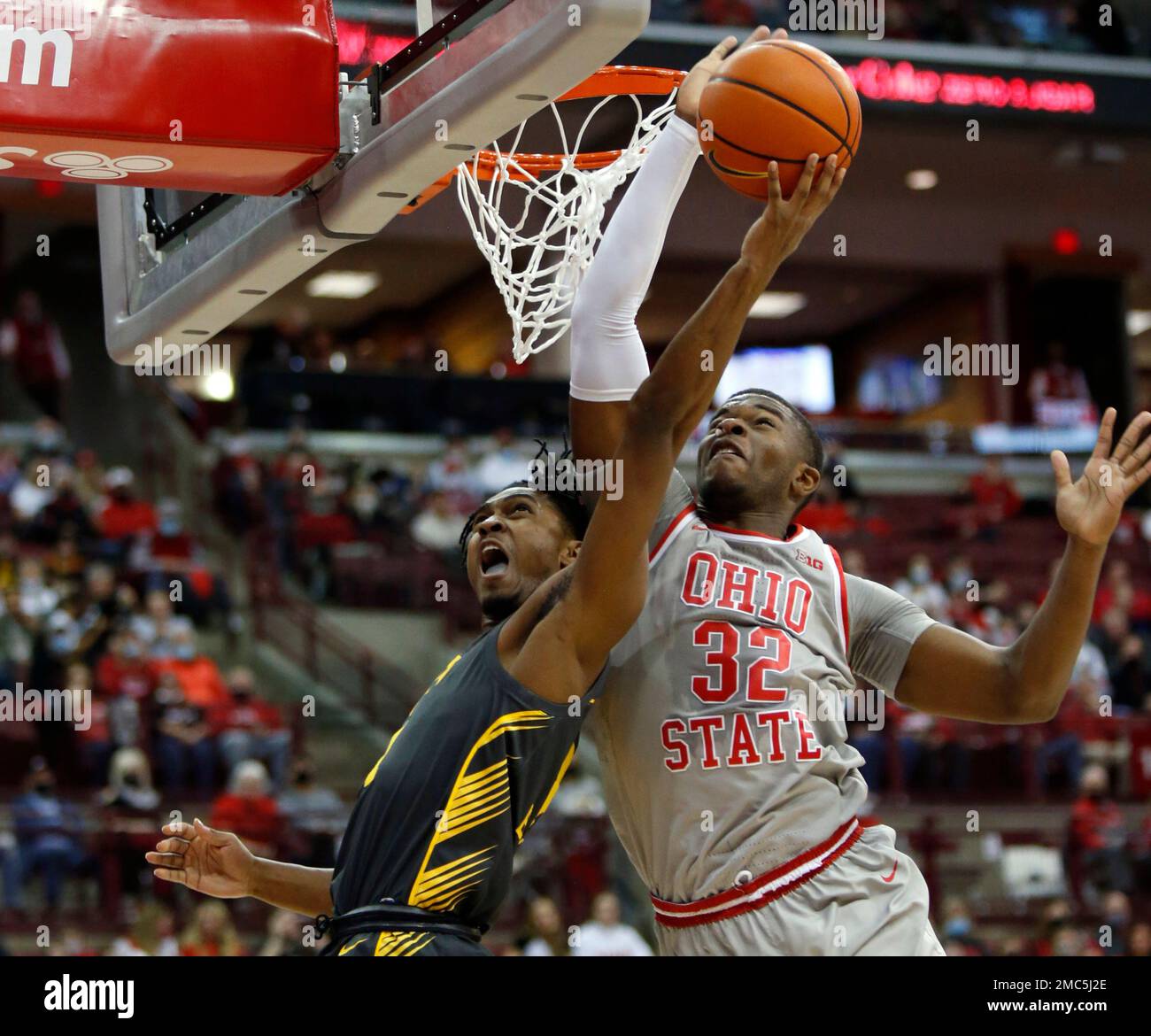Ohio State forward E.J. Liddell (32) blocks a shot by Iowa guard Ahron ...