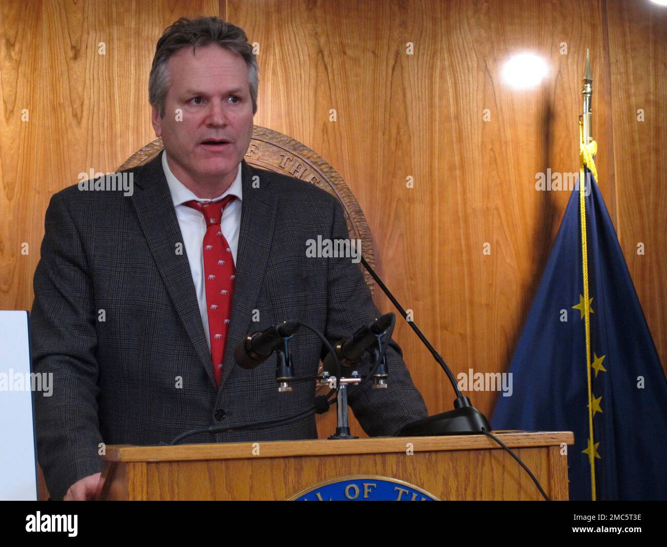 Alaska Gov. Mike Dunleavy speaks with reporters on Thursday, Feb. 17 ...