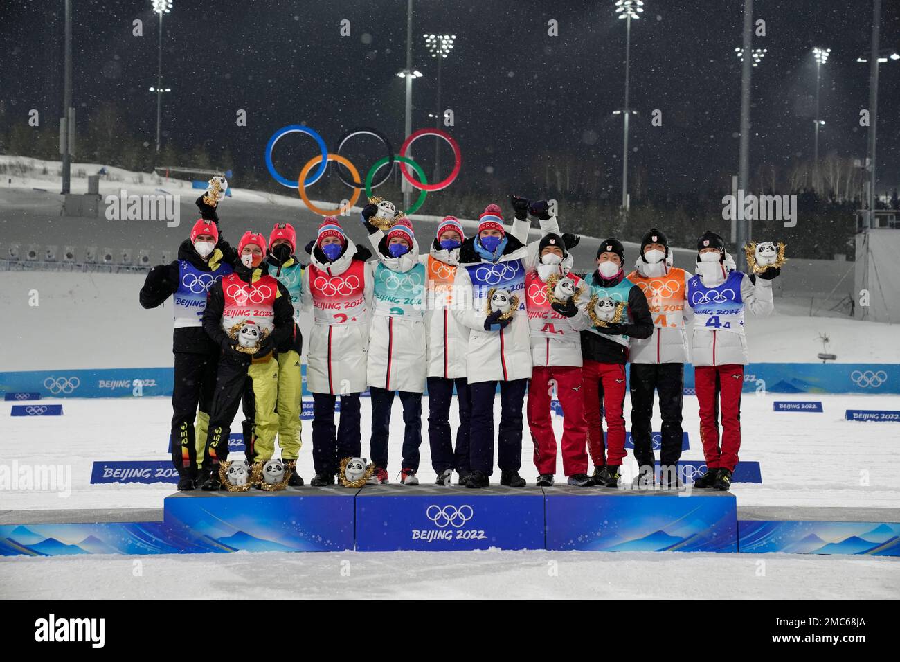 From left, silver medal finishers Germany, gold medal finishers Norway ...