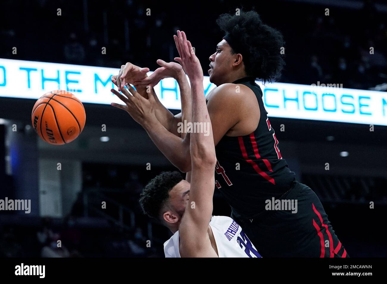 Rutgers forward Ron Harper Jr., right, drops the ball as he drives ...
