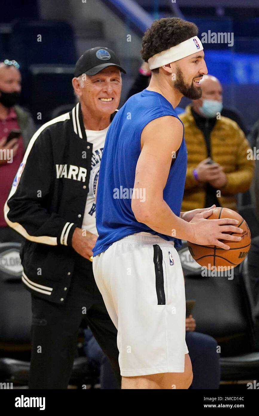 Hall of Fame basketball player Rick Barry, left, talks with Golden ...