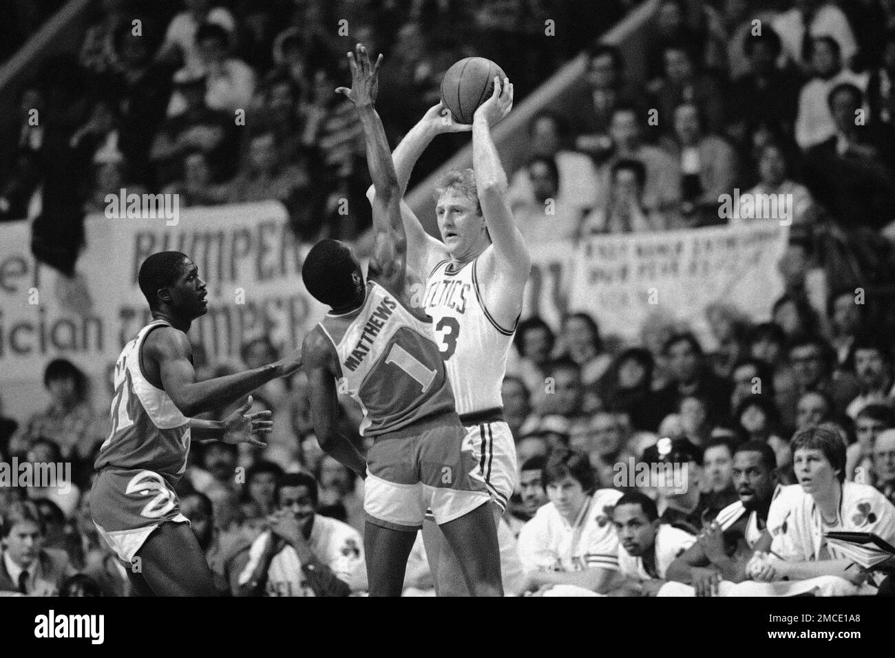 FILE - Larry Bird of the Boston Celtics, right, is defended by Wes ...