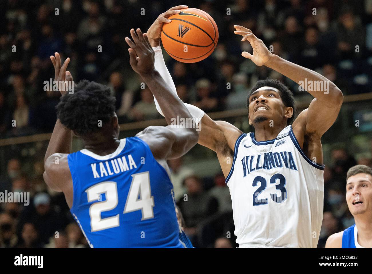 Villanova forward Jermaine Samuels (23) goes to the basket past ...