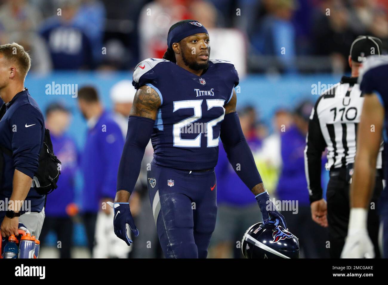 FILE - Tennessee Titans running back Derrick Henry walks on the ...