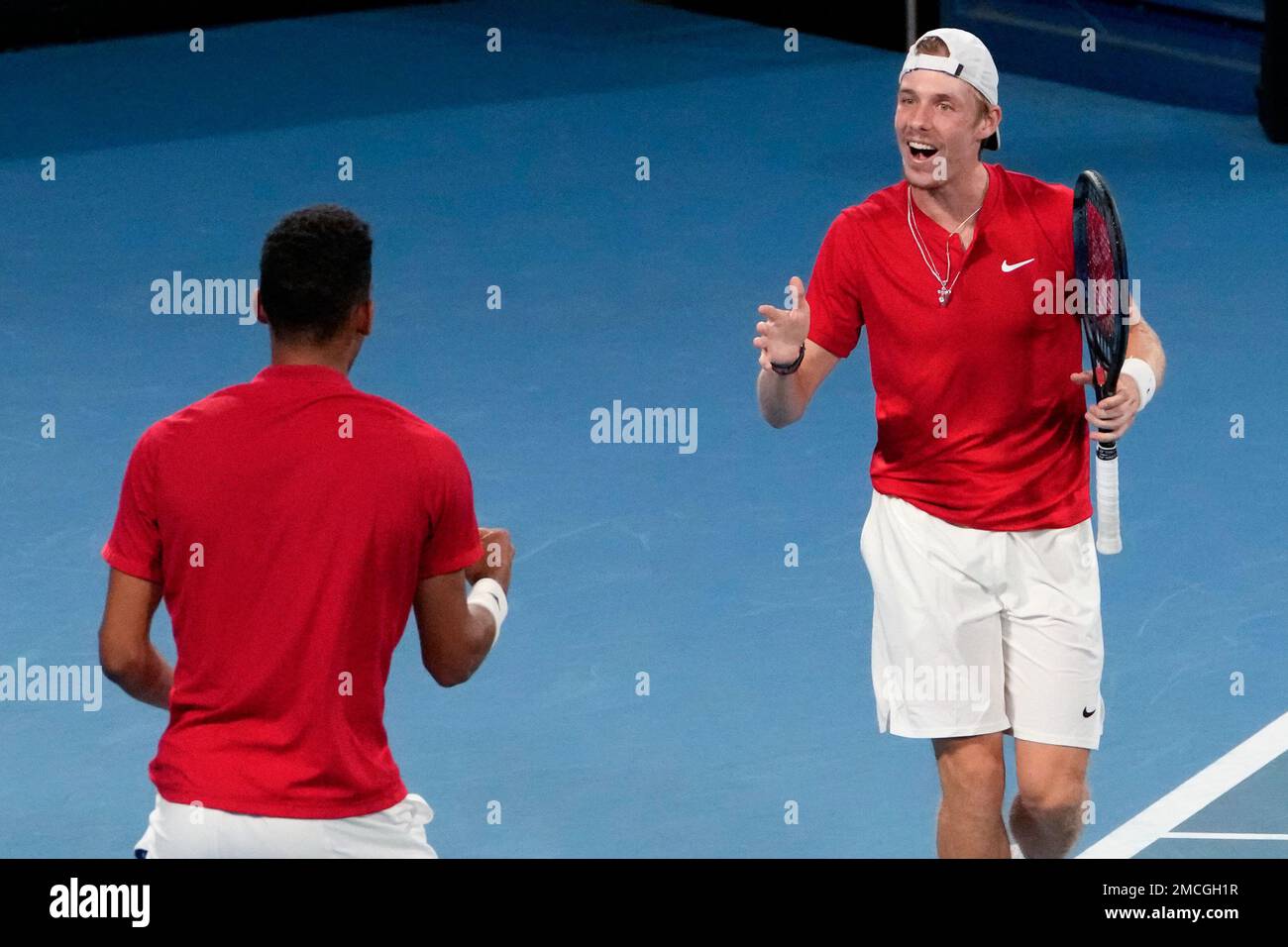 Canada's Denis Shapovalov and teammate Felix Auger-Aliassime, left, celebrate after defeating ...