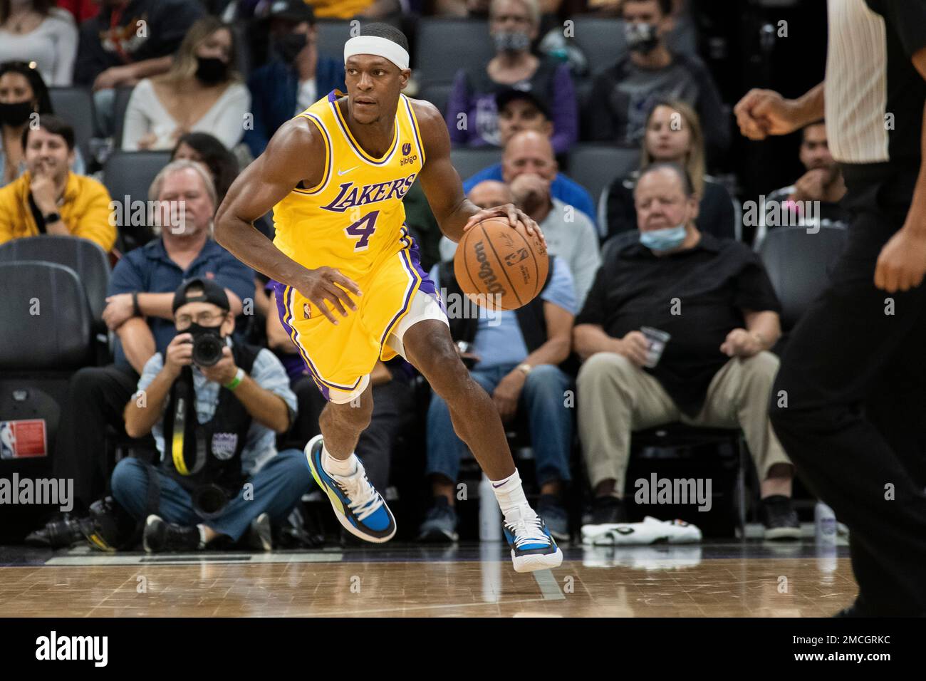FILE - Los Angeles Lakers guard Rajon Rondo (4) dribbles the ball up ...