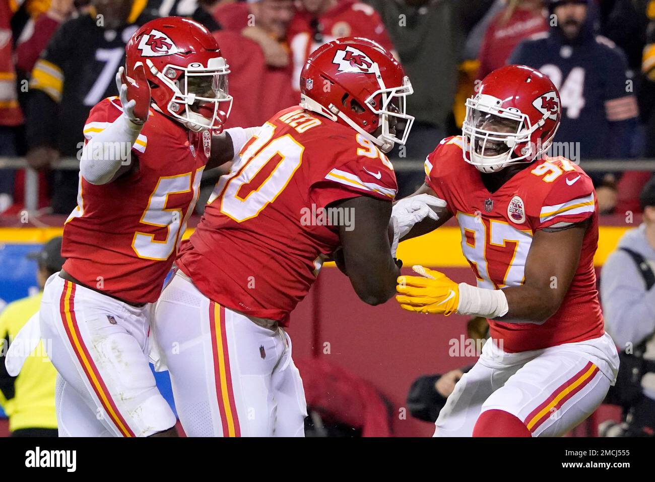 Kansas City Chiefs defensive tackle Jarran Reed, center, is ...