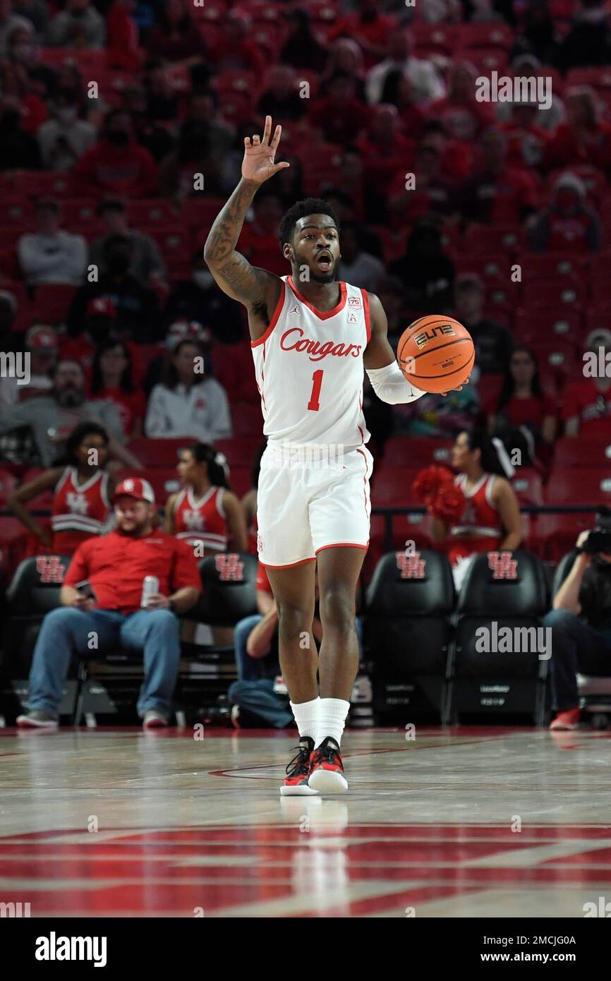 Houston guard Jamal Shead (1) dribbles the ball down the court against ...