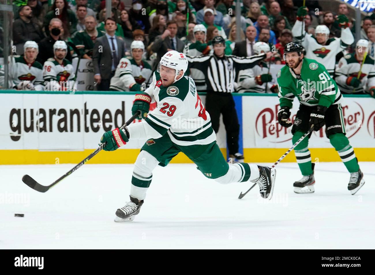 Minnesota Wild defenseman Dmitry Kulikov takes a shot as Dallas Stars ...