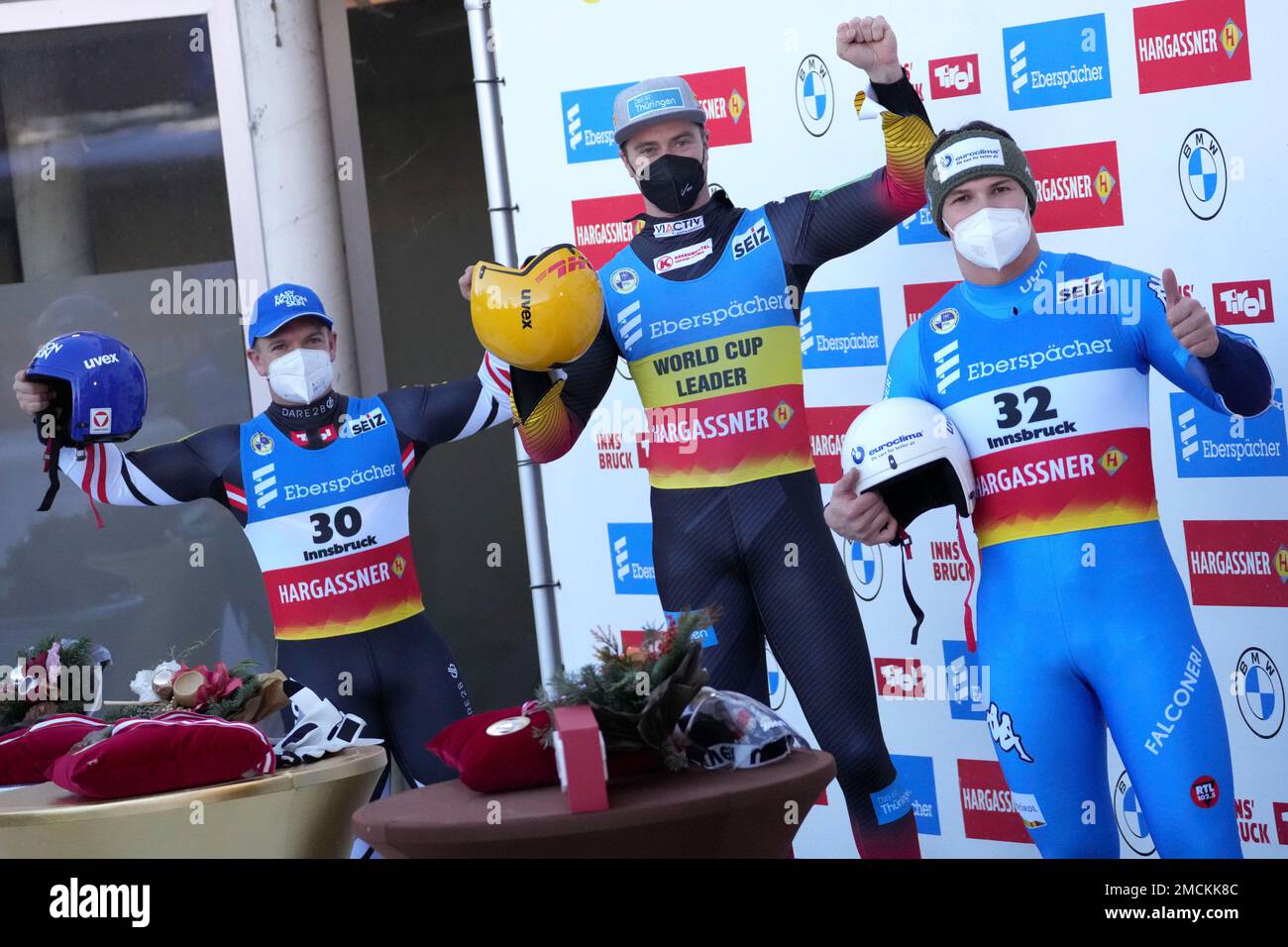 Johannes Ludwig of Germany, center, celebrates winning besides second ...