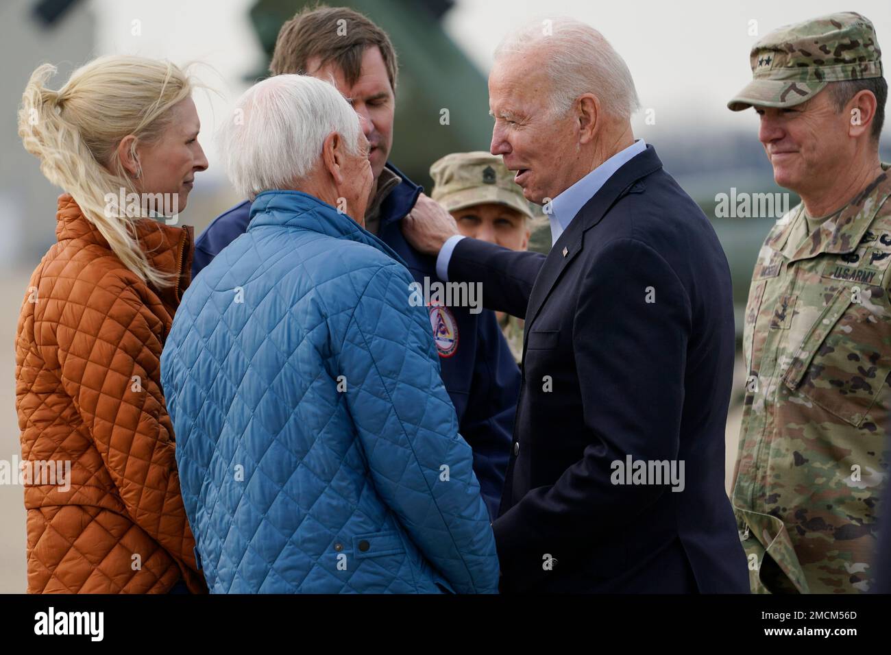 President Joe Biden greets former Gov. Steve Beshear, second from left ...