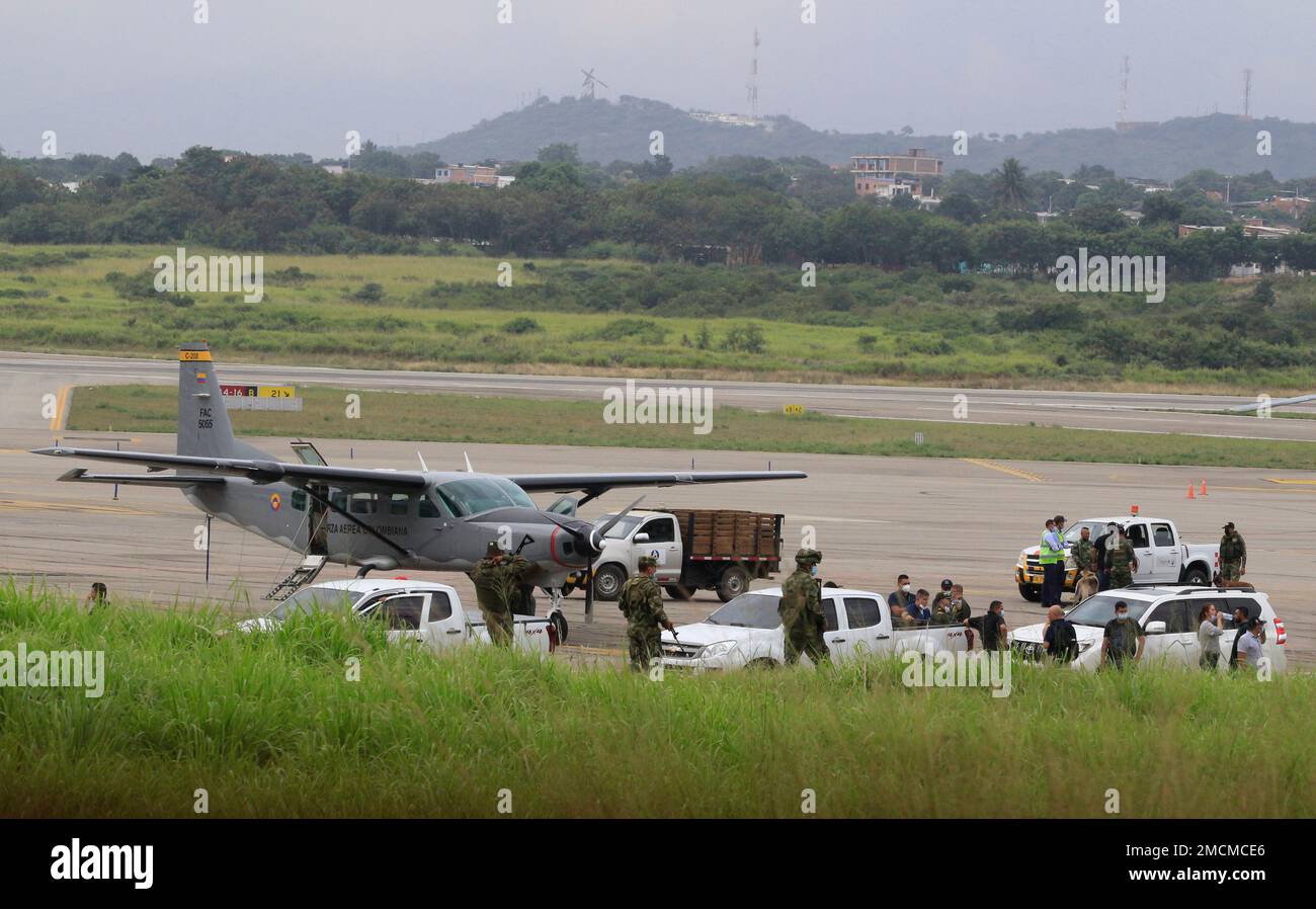 Soldiers patrol near the runway of the Camilo Daza airport where an ...