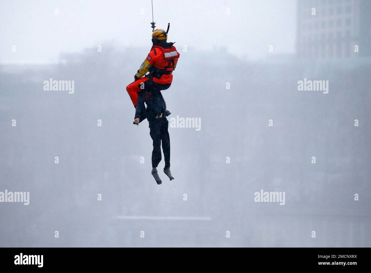 U.S. Coast Guard rescue swimmer Petty Officer 2nd Class Derrian Duryea ...