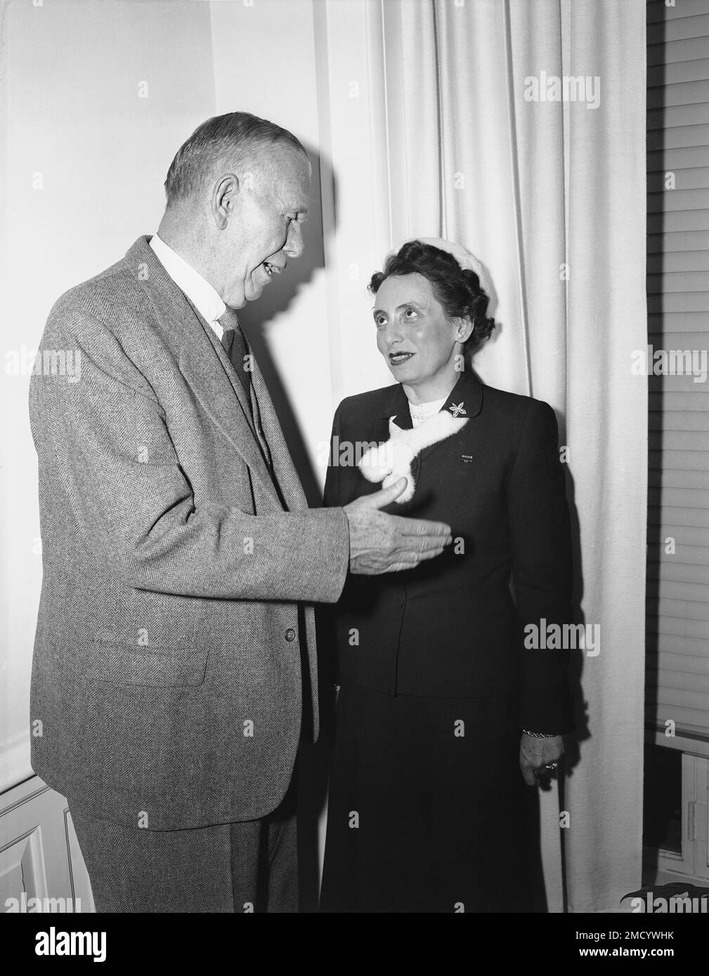 Secretary of Defense George Marshall talks with Anna M. Rosenberg of ...